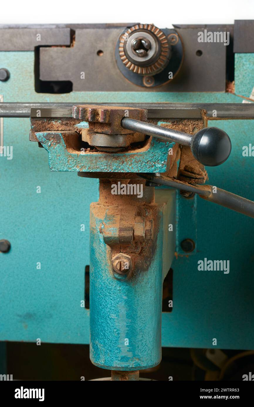 close-up of adjustment lever of old and used planing machine in ...