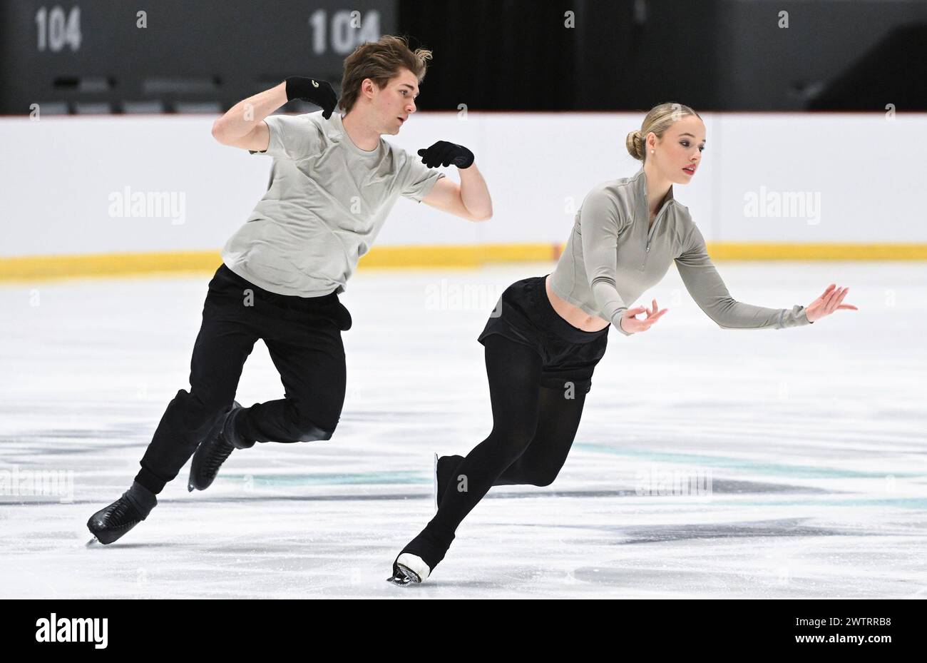 Gina Zehnder and Beda Leon Sieber, from Switzerland, perform their ice ...