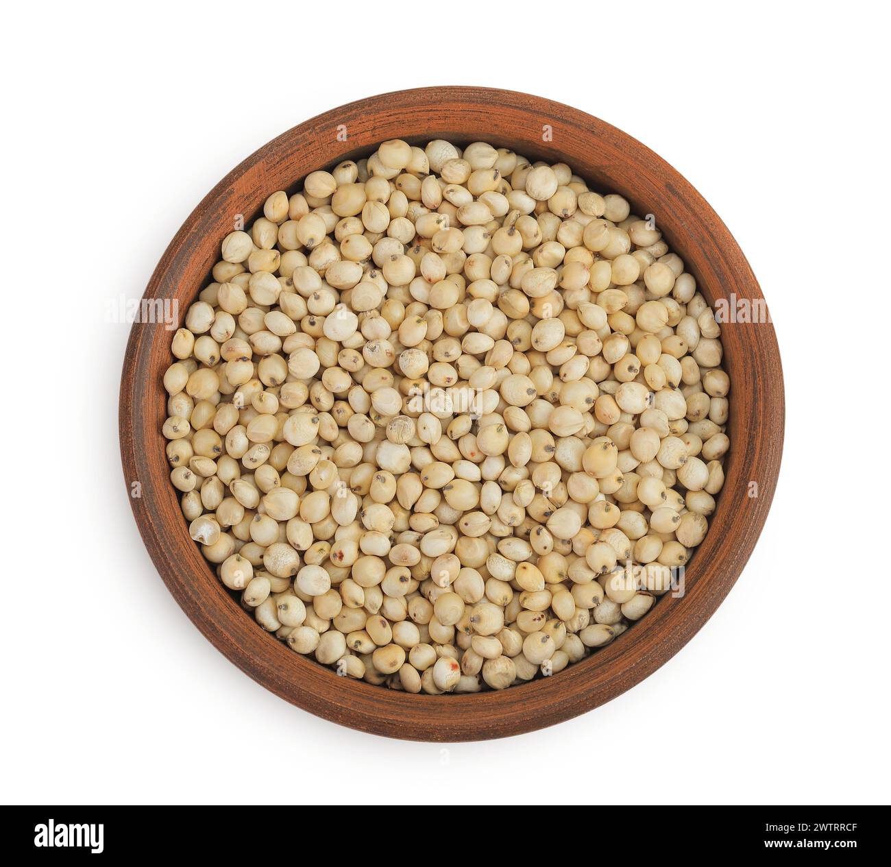 Sorghum seeds in ceramic bowl isolated on white background. Top view ...