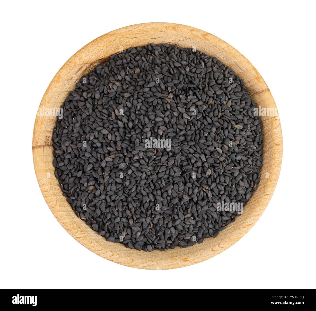 black sesame seeds in wooden bowl isolated on white background. Top ...