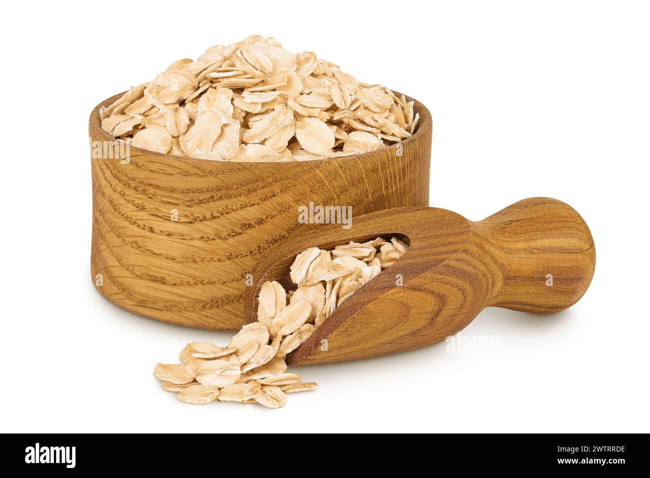 Oat flakes in wooden bowl and scoop isolated on white background with ...