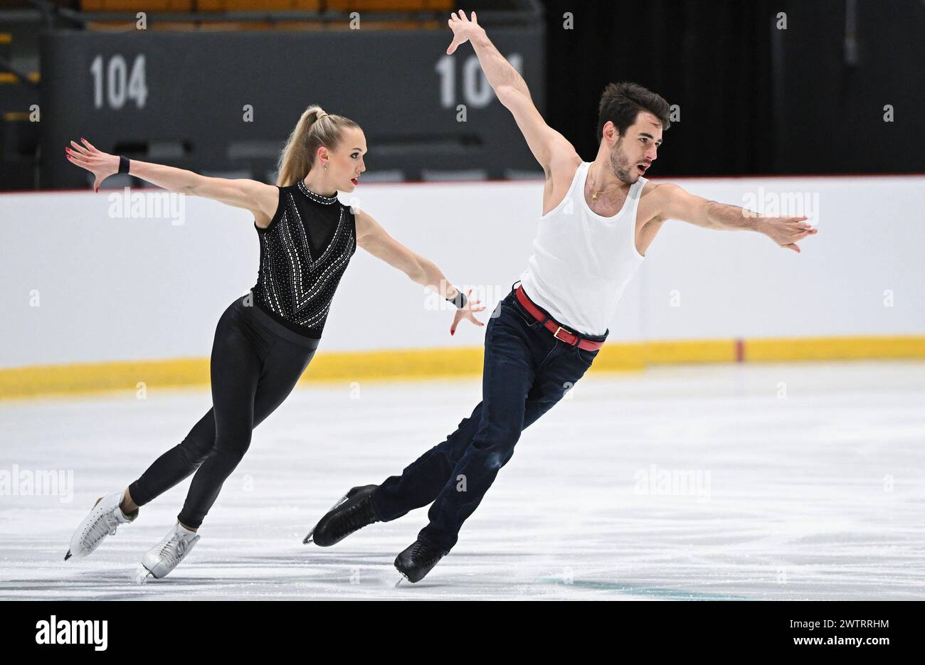 Hanna Jakucs and Alessio Galli, from the Netherlands, perform their ice ...