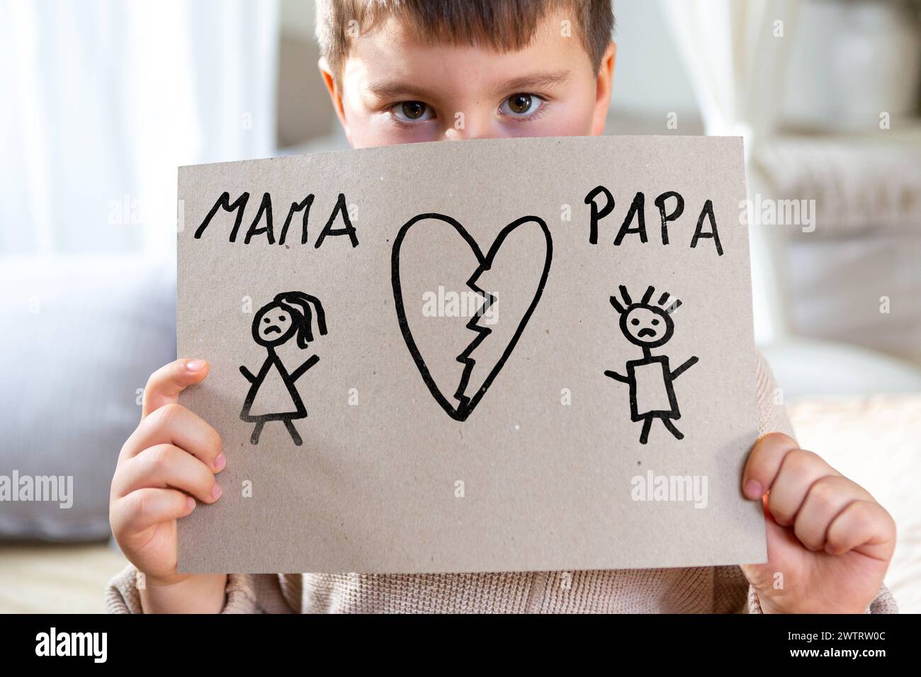March 19, 2024: Little boy holding a sign with a drawing about his ...