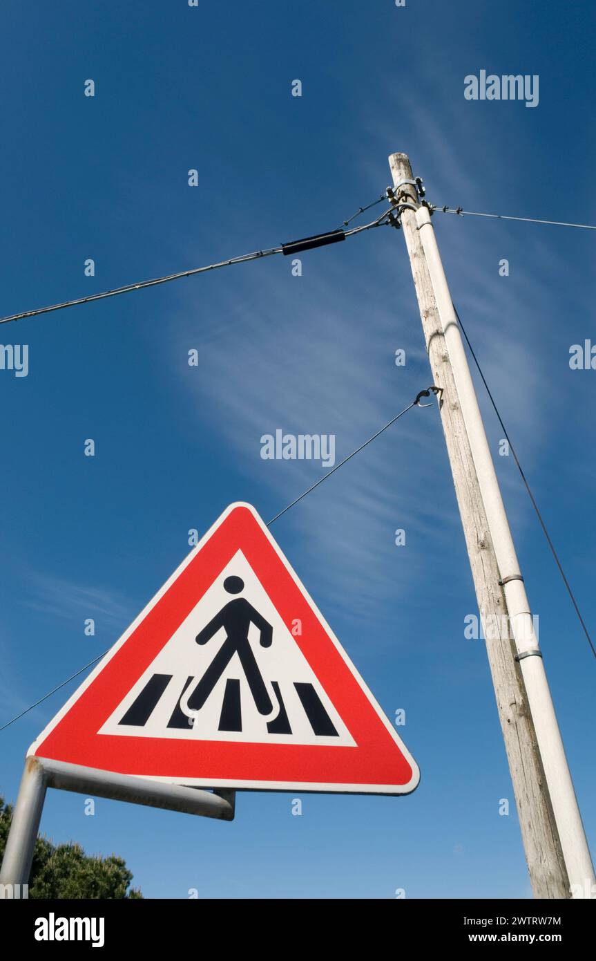 Pedestrian crossing sign and telephone pole Stock Photo - Alamy