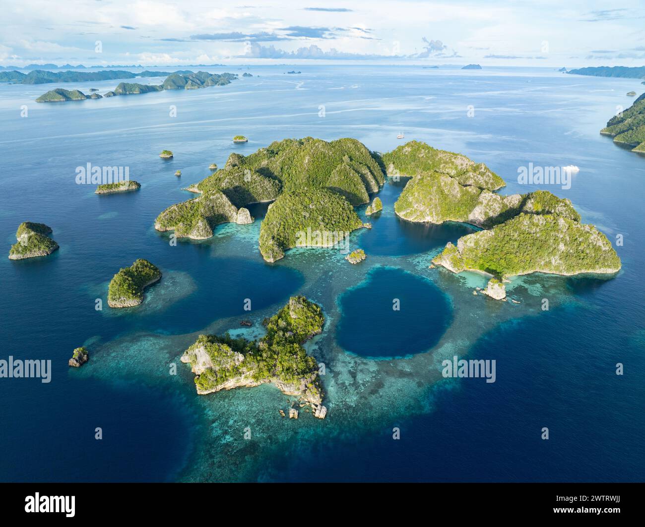 Beautiful limestone islands rise from Raja Ampat's tropical seascape ...