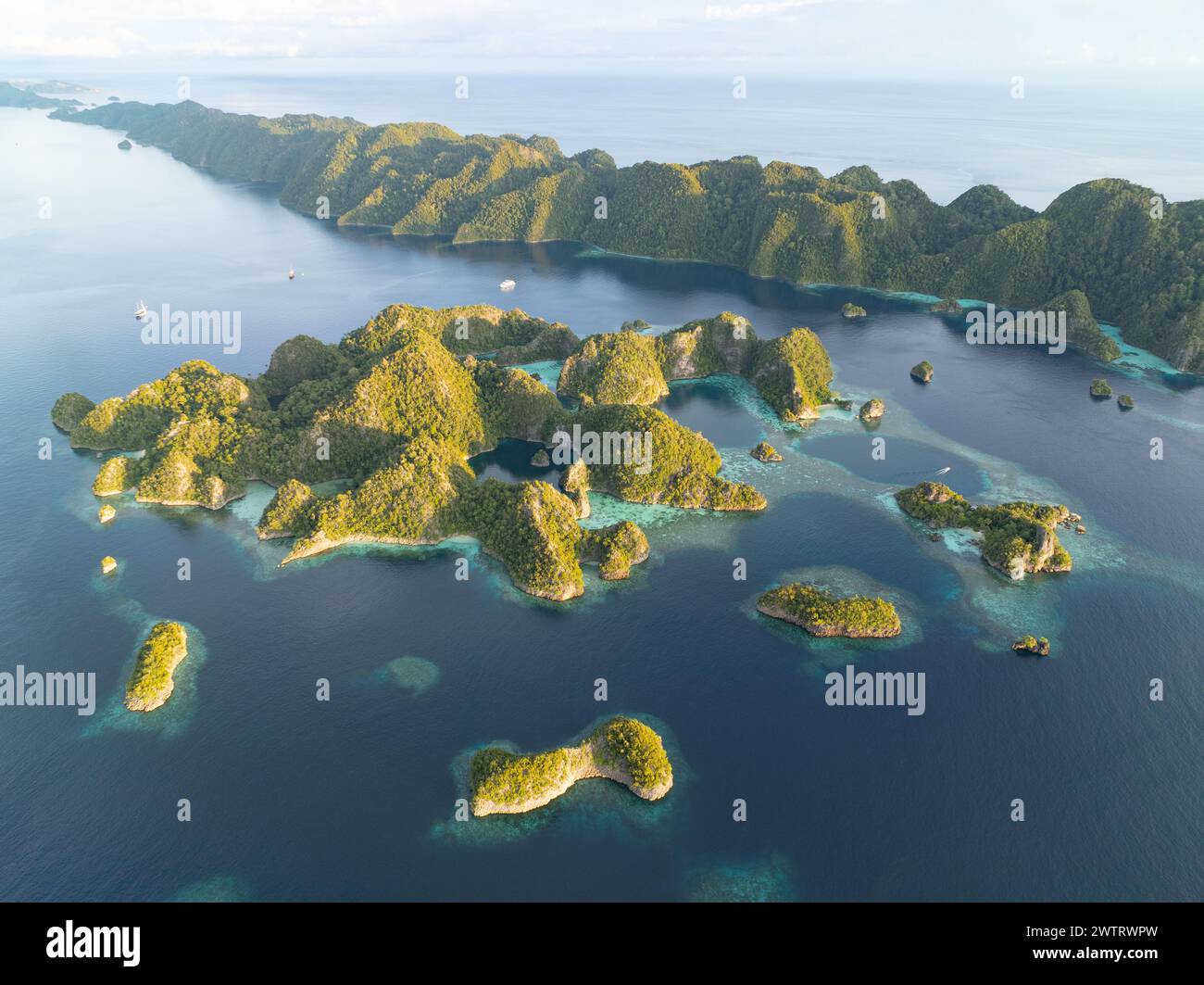 Beautiful limestone islands rise from Raja Ampat's tropical seascape ...