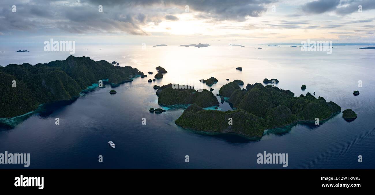 Beautiful limestone islands rise from Raja Ampat's tropical seascape ...