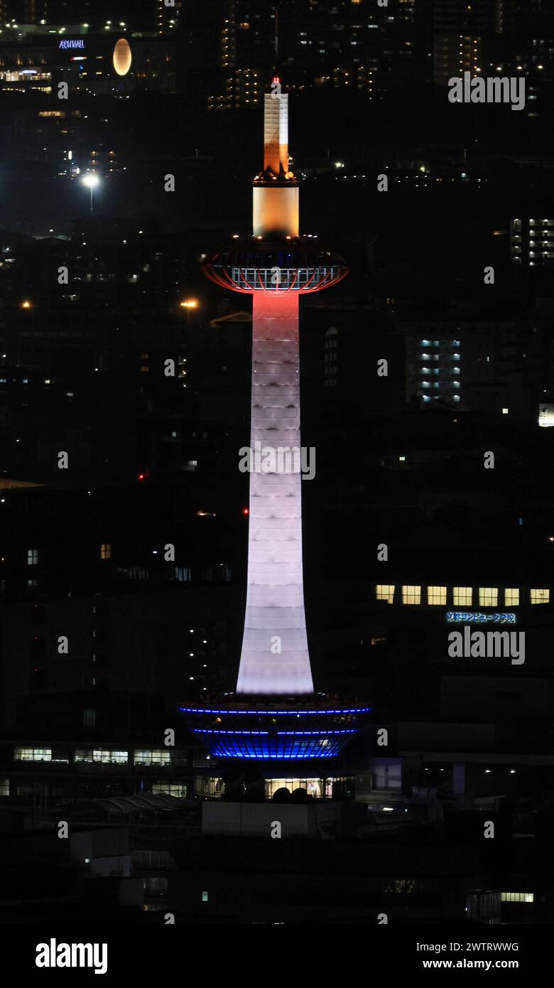 Kyoto Tower, a 100-meter observation deck is illuminated in Shimogyo ...