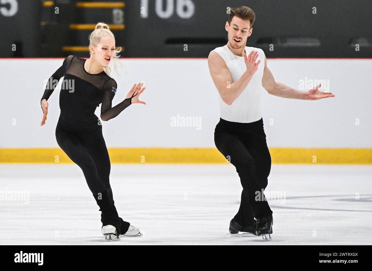 Juulia Turkkila and Matthias Versluis, from Finland, perform their ice ...