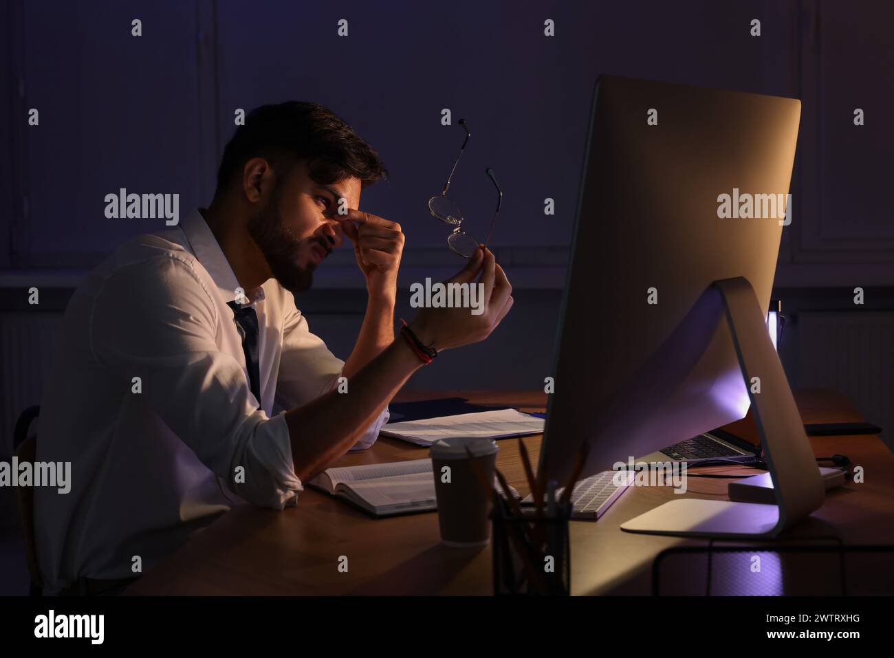 Indian guy working at night hi-res stock photography and images - Alamy