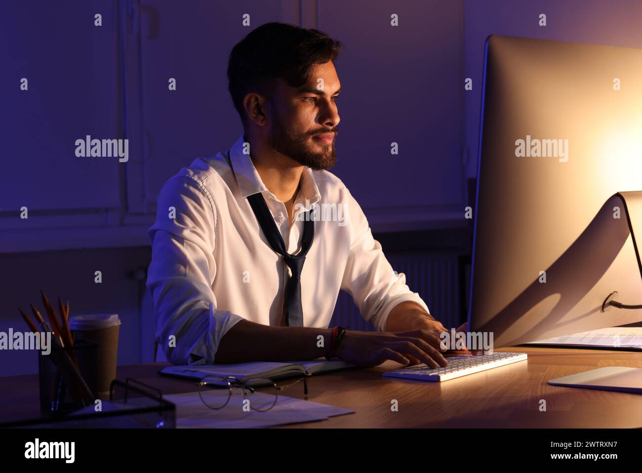 Indian guy working at night hi-res stock photography and images - Alamy