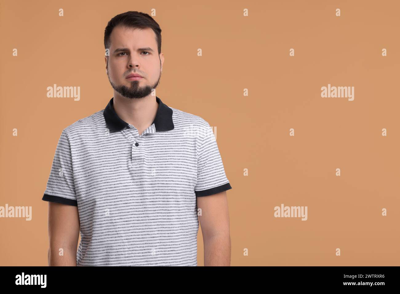 Man all beige hi-res stock photography and images - Alamy