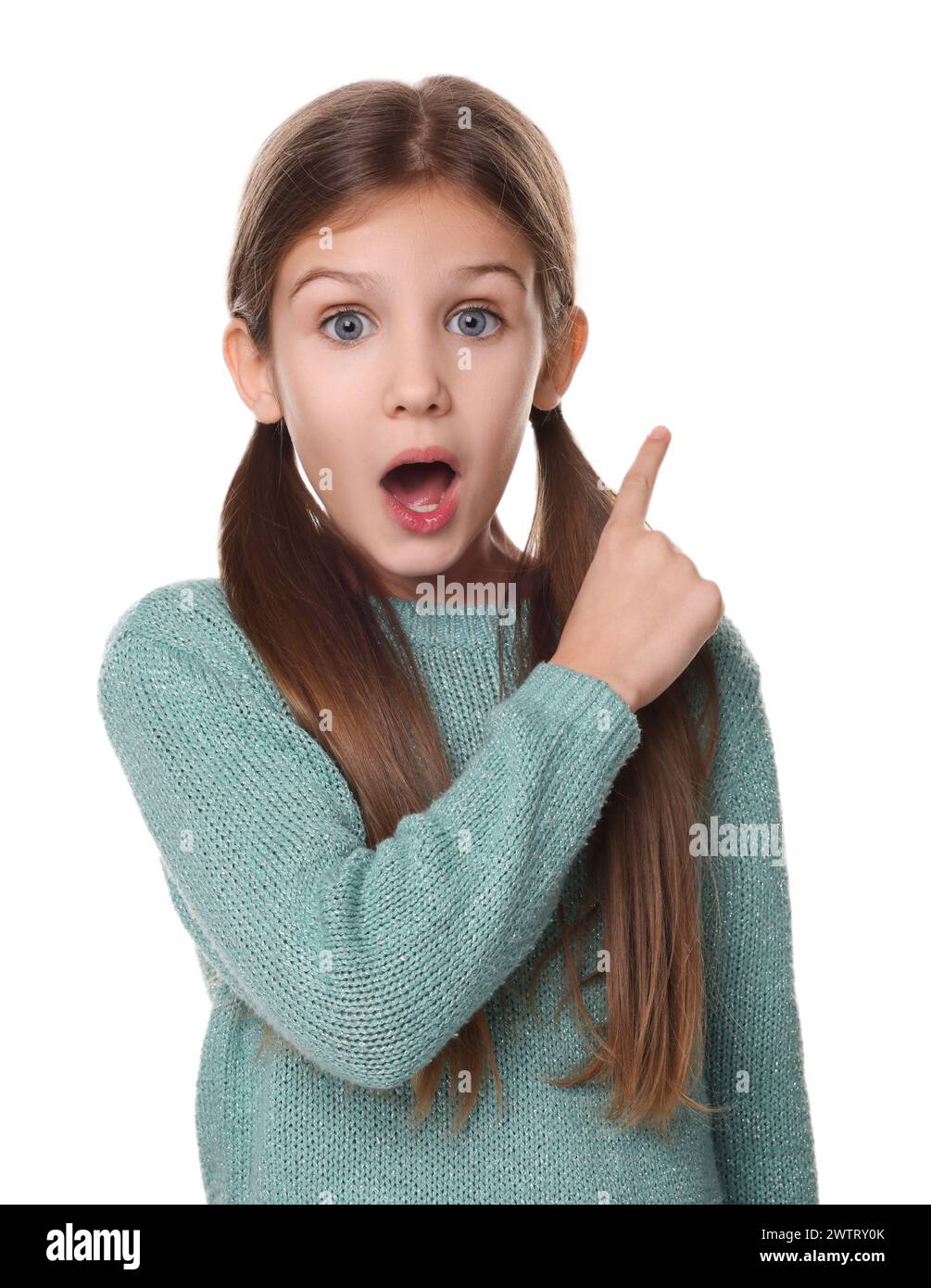Surprised girl pointing on face hi-res stock photography and images - Alamy