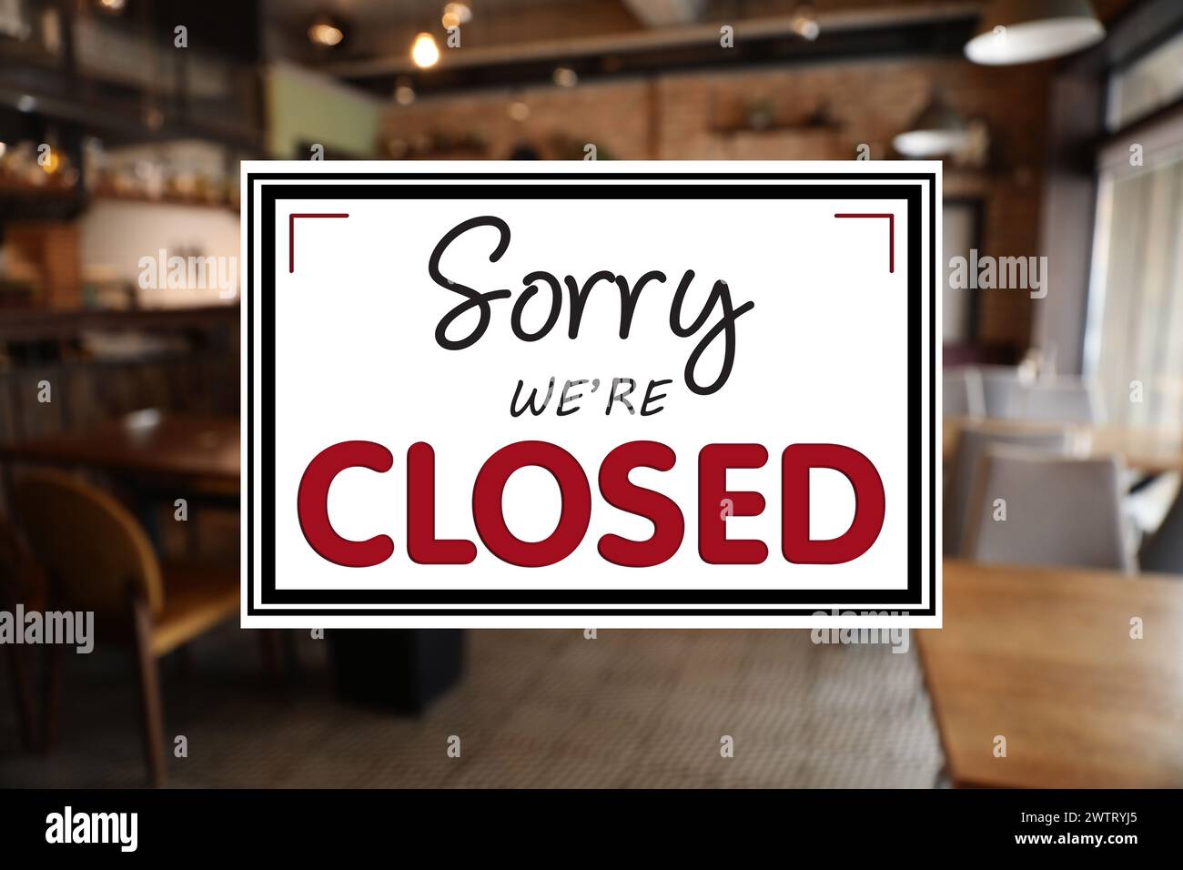 Sorry we are closed sign against blurred background Stock Photo - Alamy