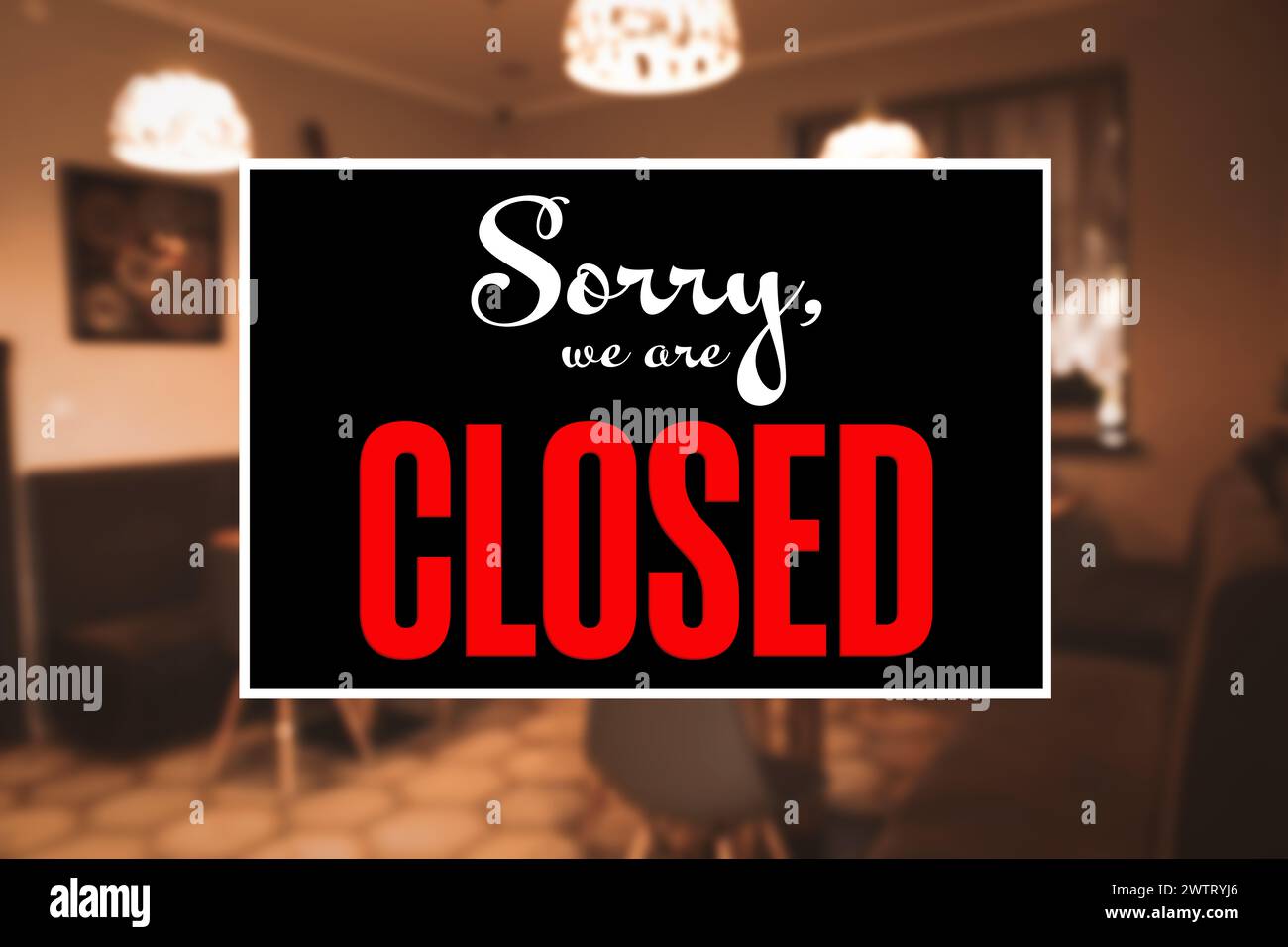 Sorry we are closed sign against blurred background Stock Photo - Alamy