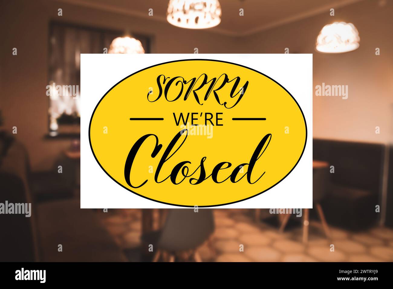 Sorry we are closed sign against blurred background Stock Photo - Alamy