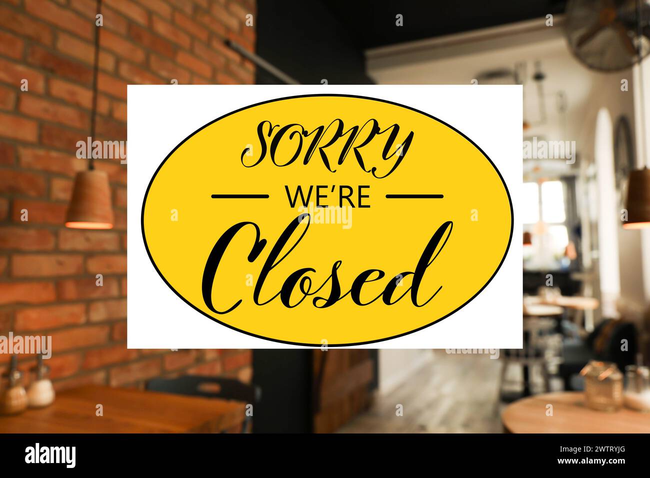 Sorry we are closed sign against blurred background Stock Photo - Alamy