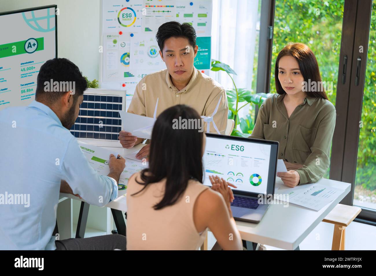 diversity team brainstorming discussion focused on ESG (environment,social,governance) for sdgs ...