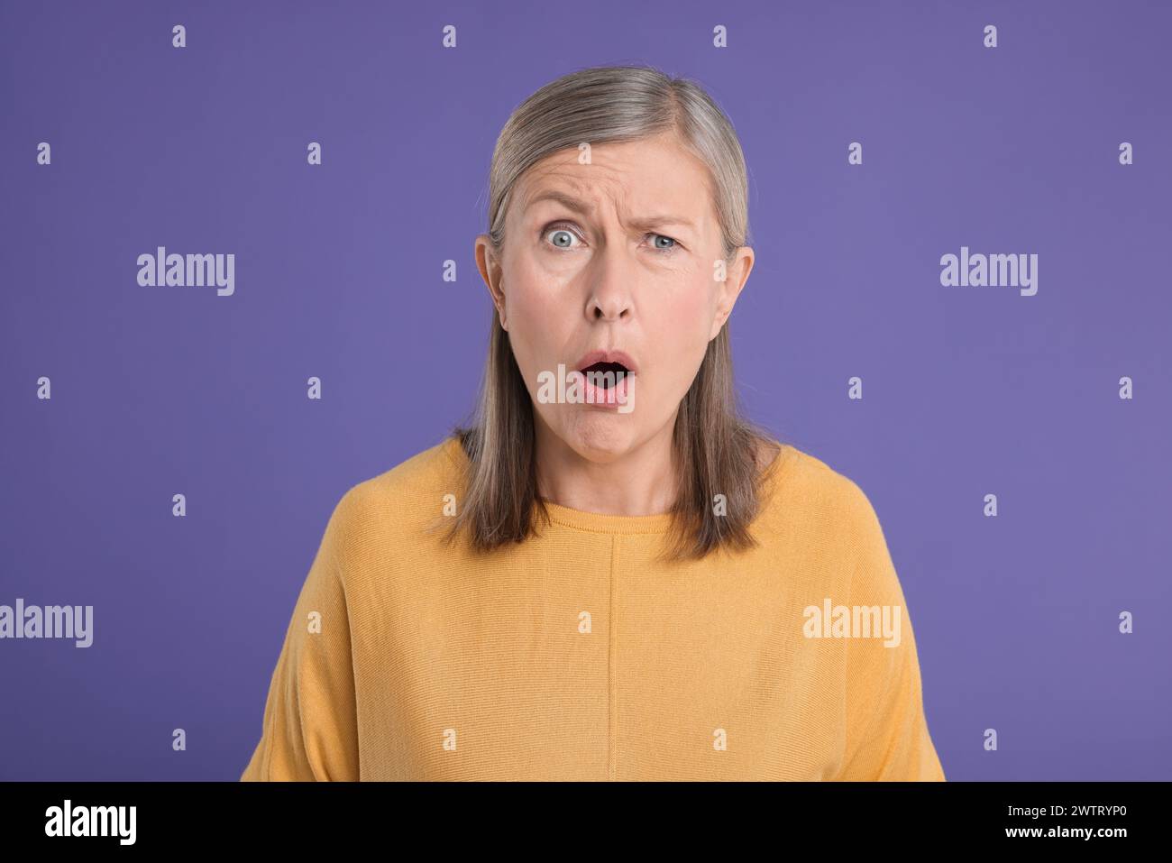 Senior woman shocked expression hi-res stock photography and images - Alamy