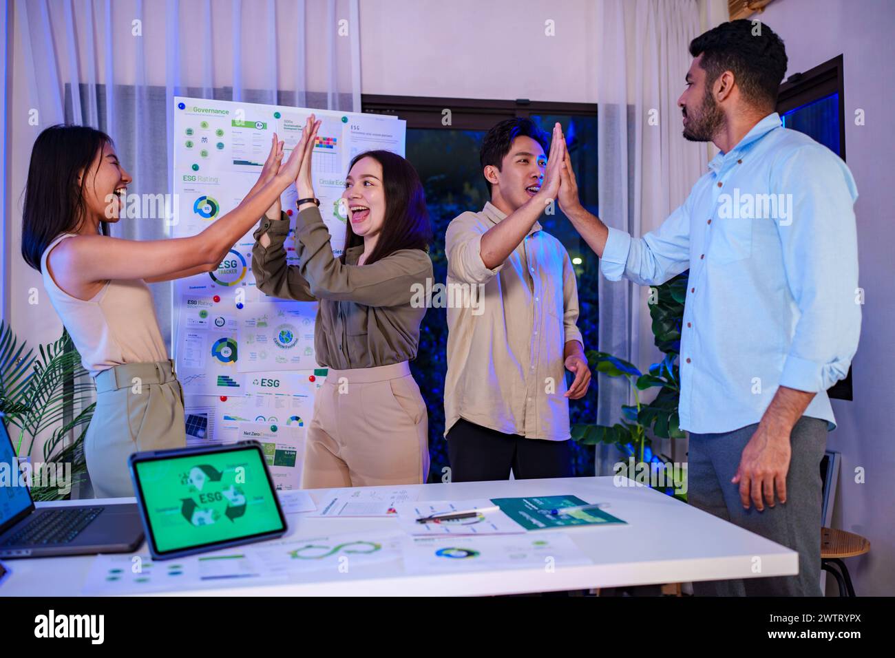 diversity team celebration and high five of sustainability goals is ...