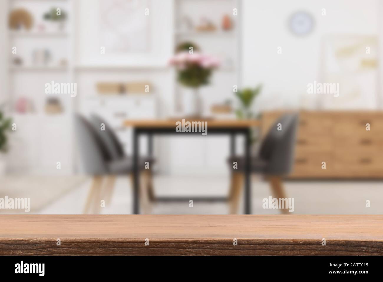 Empty wooden table in dining room. Space for design Stock Photo - Alamy