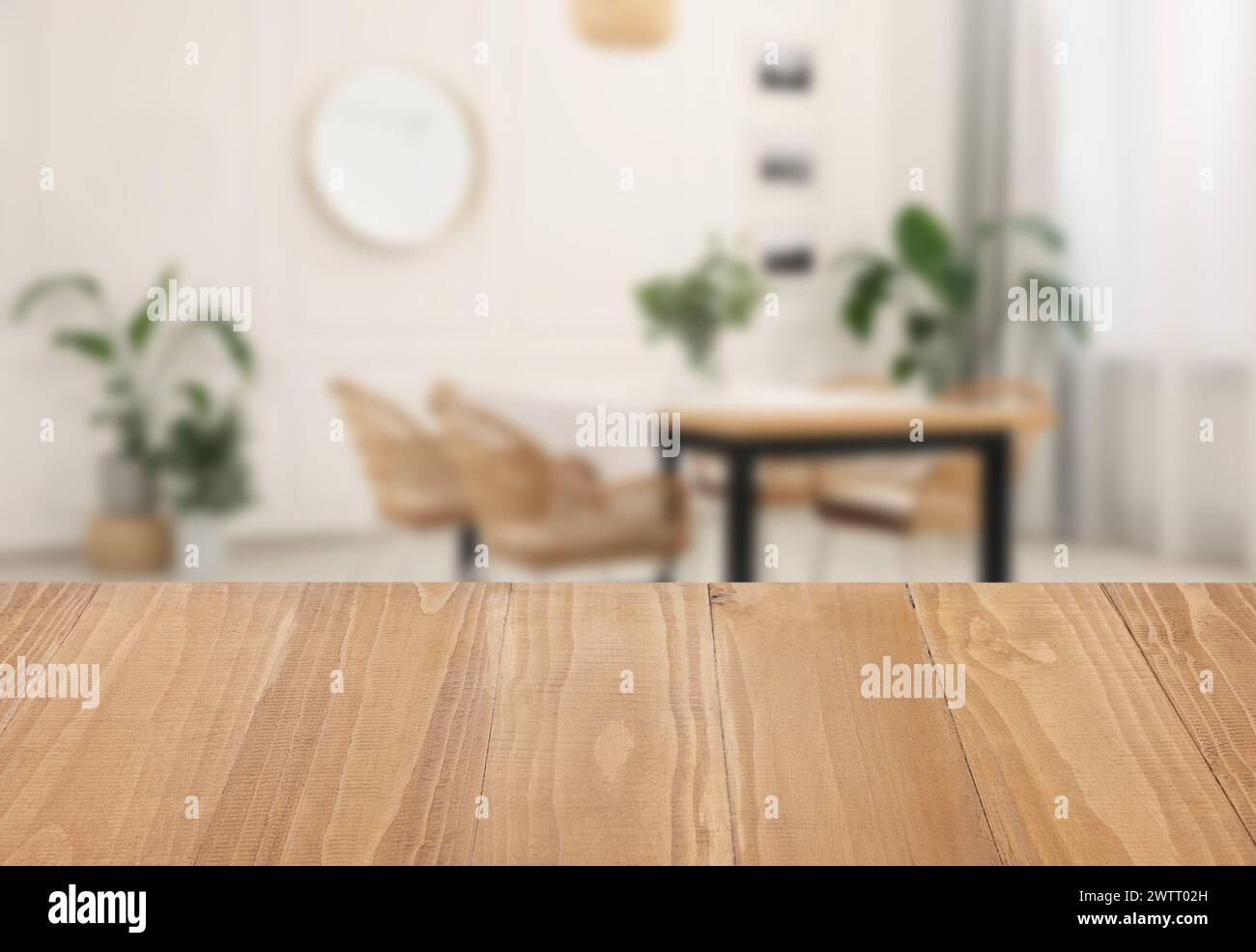 Empty wooden table in dining room. Space for design Stock Photo - Alamy