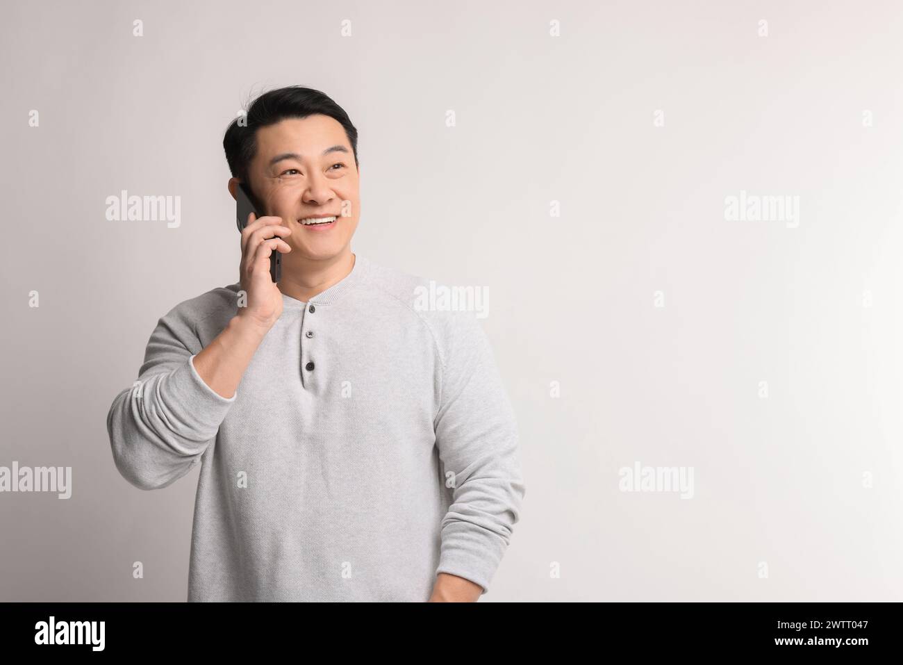 Happy delighted man talking hi-res stock photography and images - Alamy