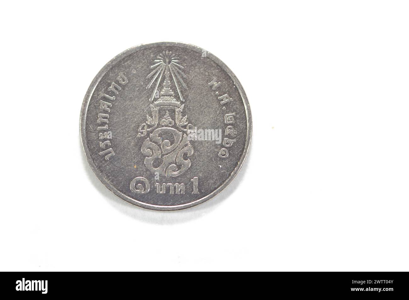 Reverse side of 1 one Baht Thai coin features Crowned monogram, 1 Baht ...