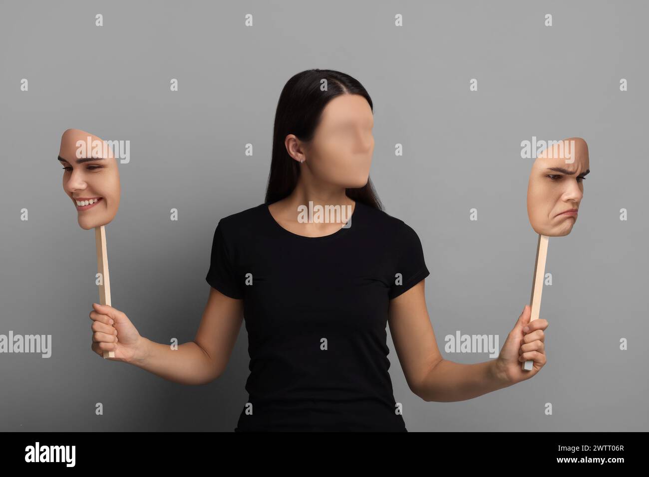 Faceless woman holding her face masks showing different emotions on ...