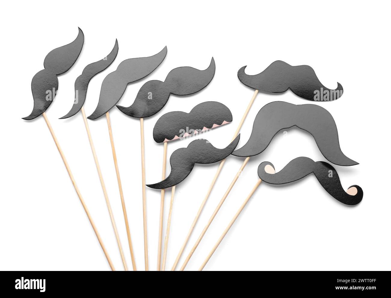 Fake paper mustaches with party props isolated on white, top view Stock ...