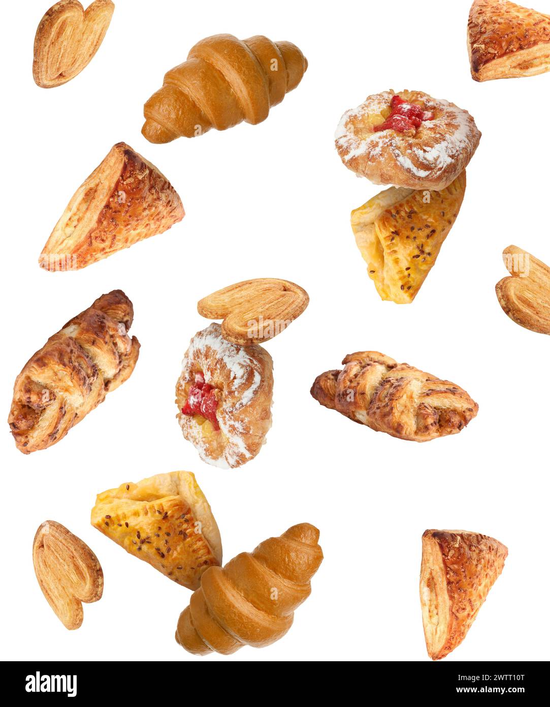 Different tasty puff pastries falling on white background Stock Photo ...