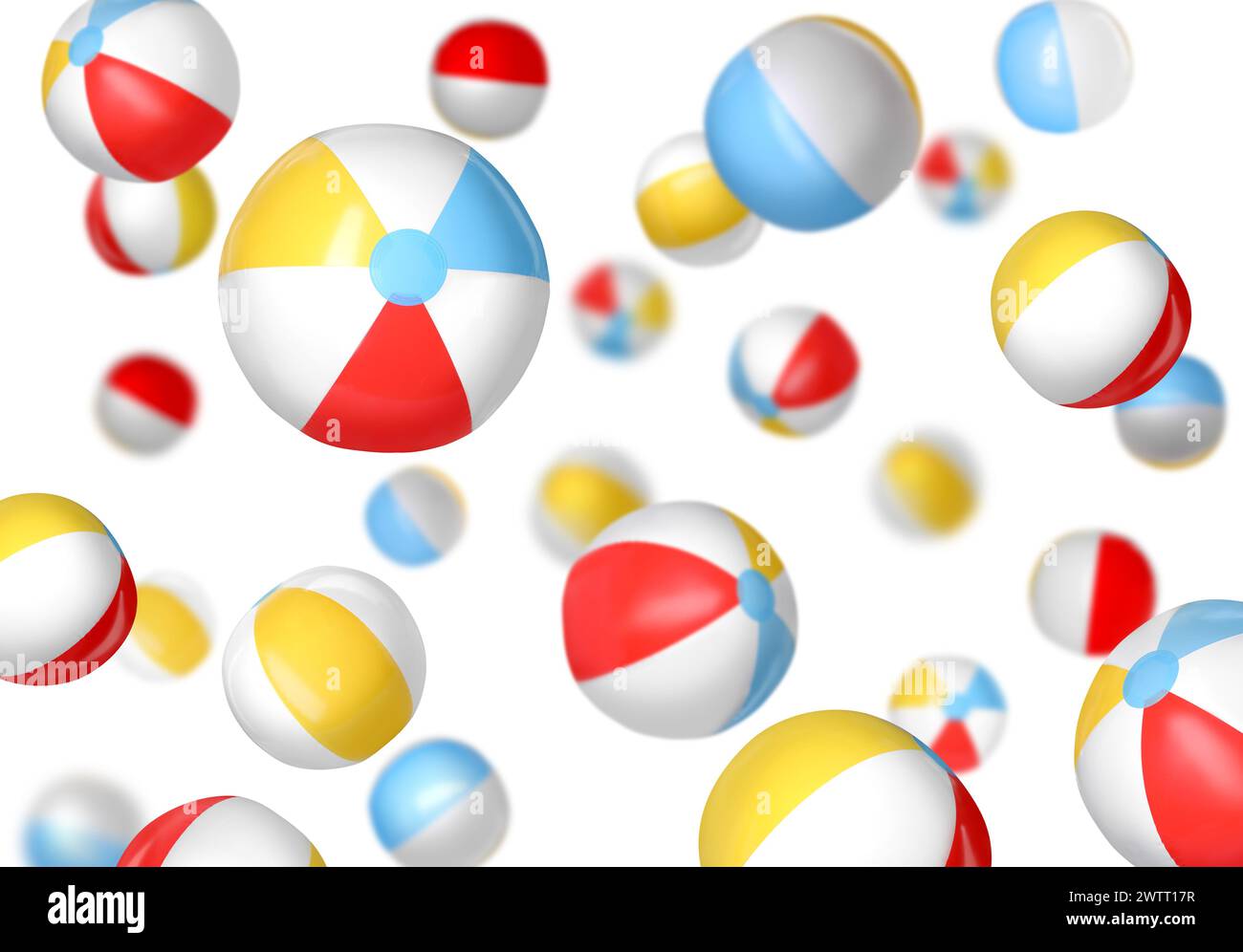 Colorful inflatable balls falling on white background Stock Photo - Alamy