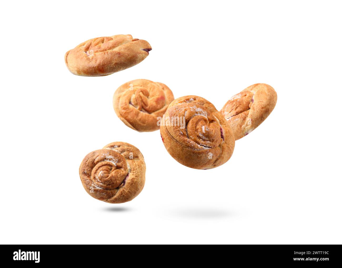 Sweet buns. Delicious rolls with jam falling on white background Stock ...