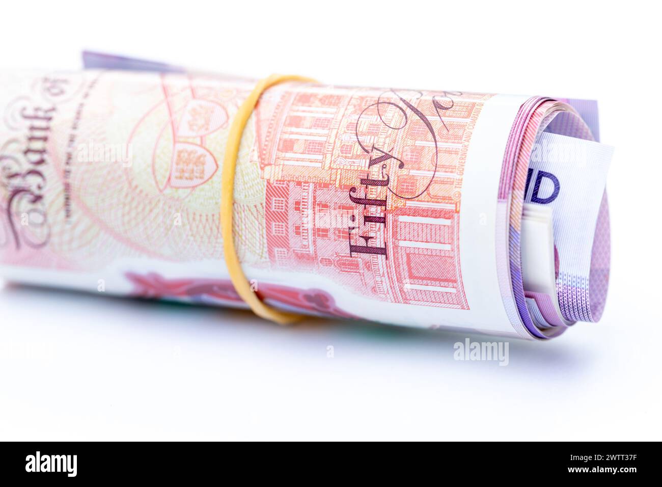 Roll of UK £50 bank notes Stock Photo - Alamy