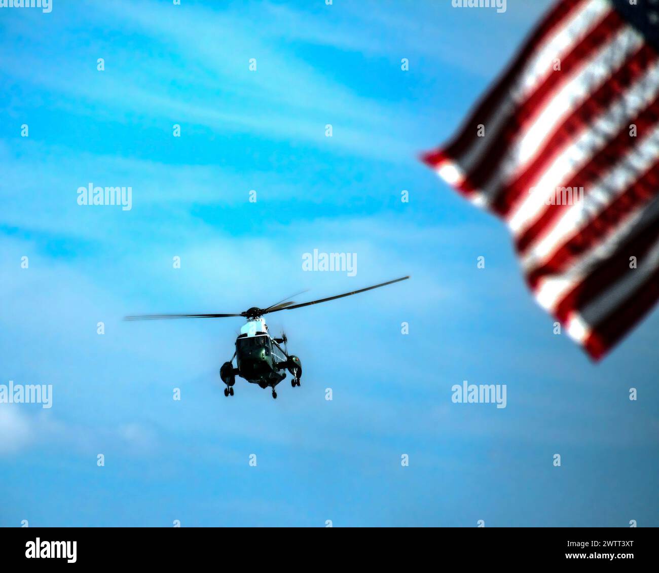 Taking off over the flag Stock Photo - Alamy