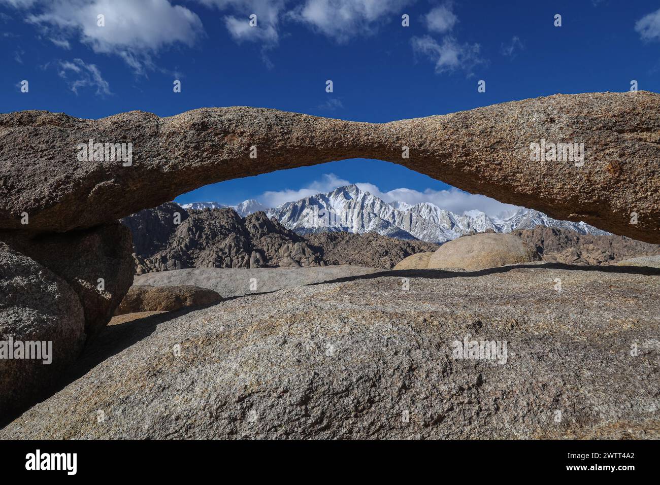 Lathe Arch framing Mt Whitney and the Sierra Nevada mountains is a ...