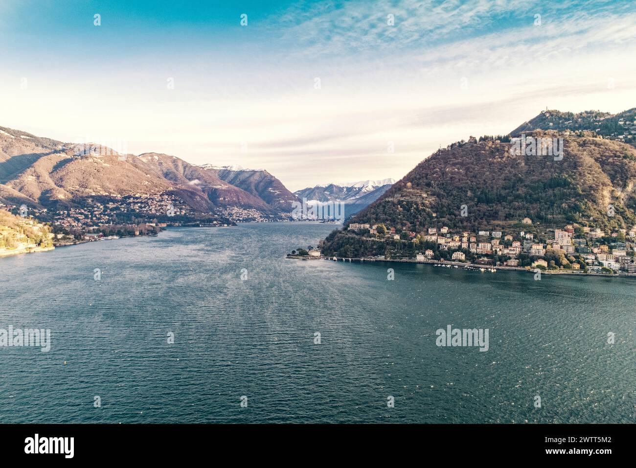 Aerial view of lake Como with the Alps and villages around the lake ...