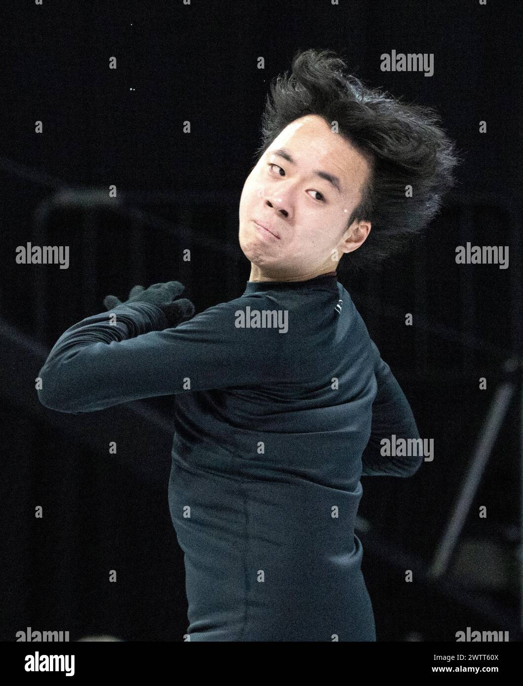 Wesley Chiu, of Canada, performs his routine during a practice for the ...