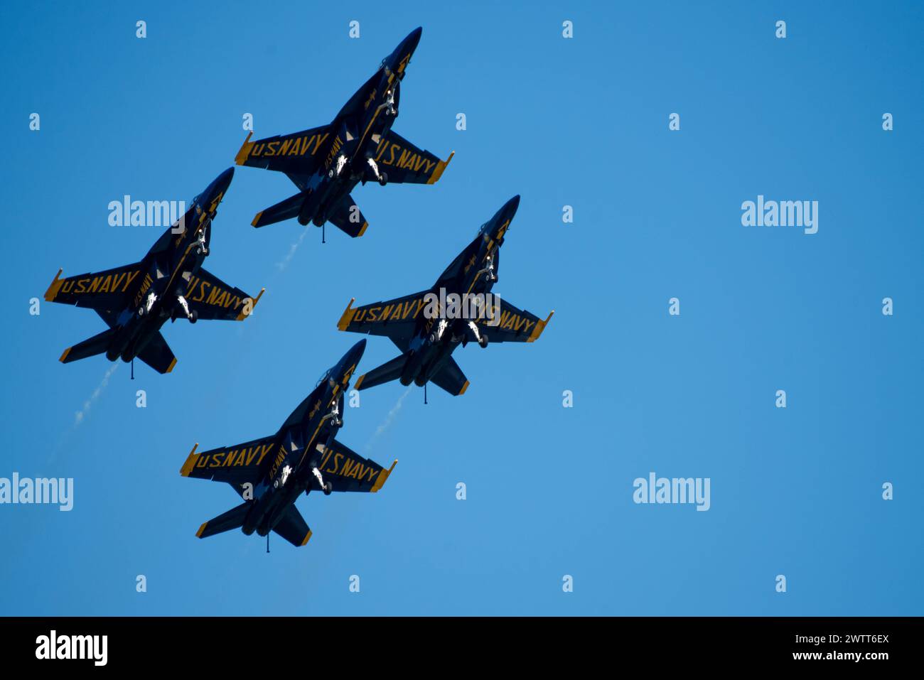 F/A-18 Super Hornets assigned to the Blue Angels perform aerobatic ...
