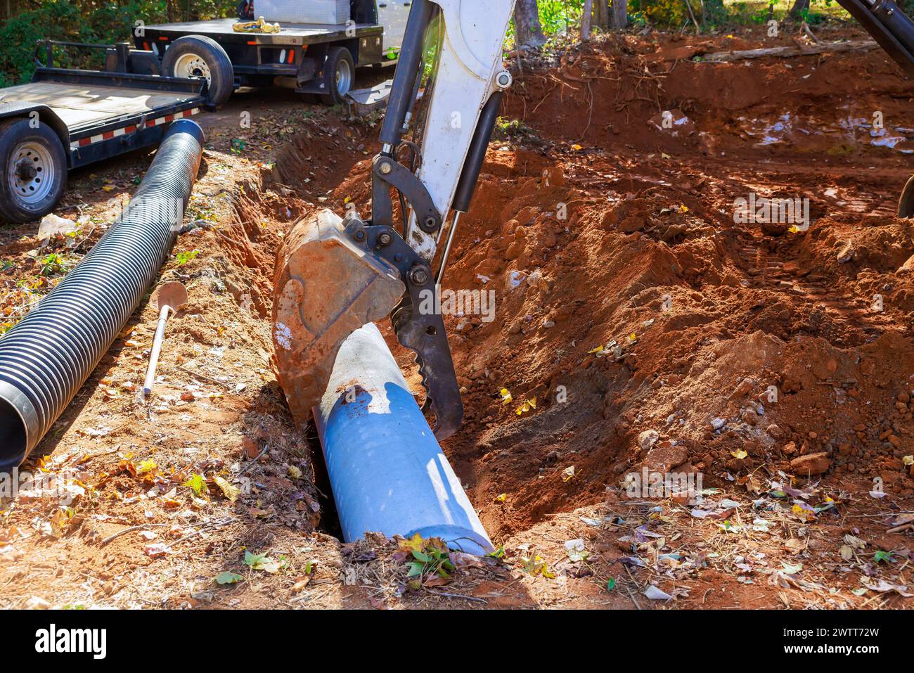At construction sites, pipes are laid for flow of rainwater into water ...
