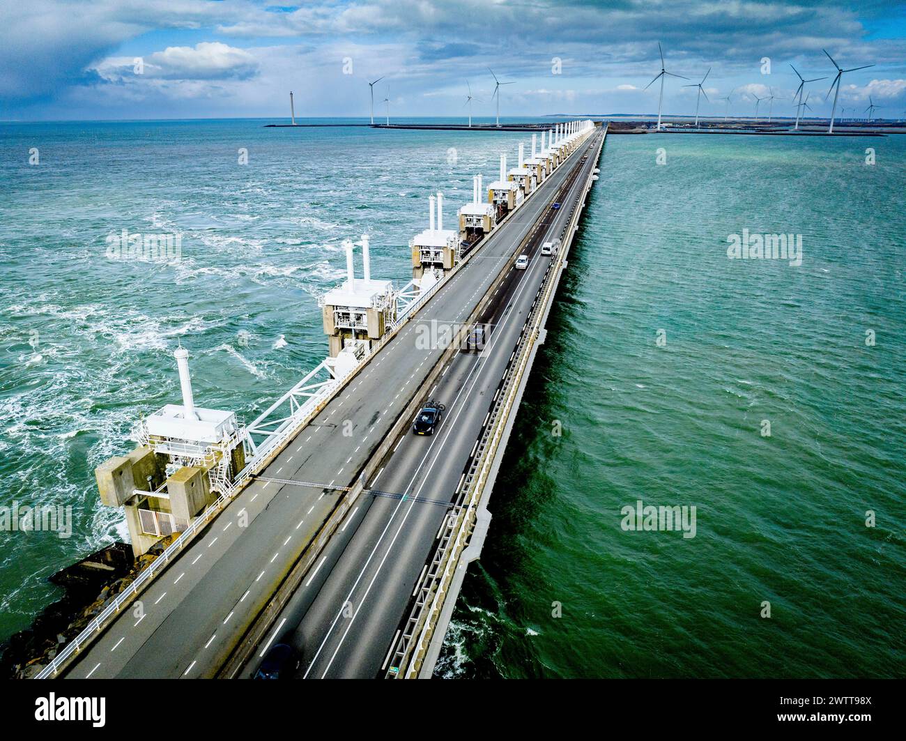 Aerial view of a coastal highway bridge with cars traveling over the ocean Stock Photo - Alamy