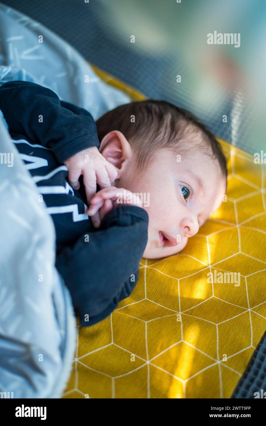 Newborn baby lying down hi-res stock photography and images - Alamy