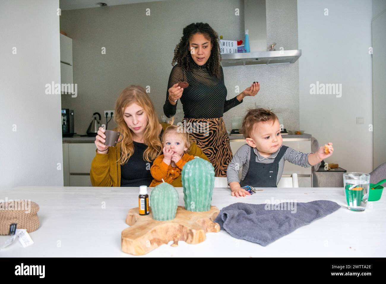 Woman multitasking children hi-res stock photography and images - Alamy