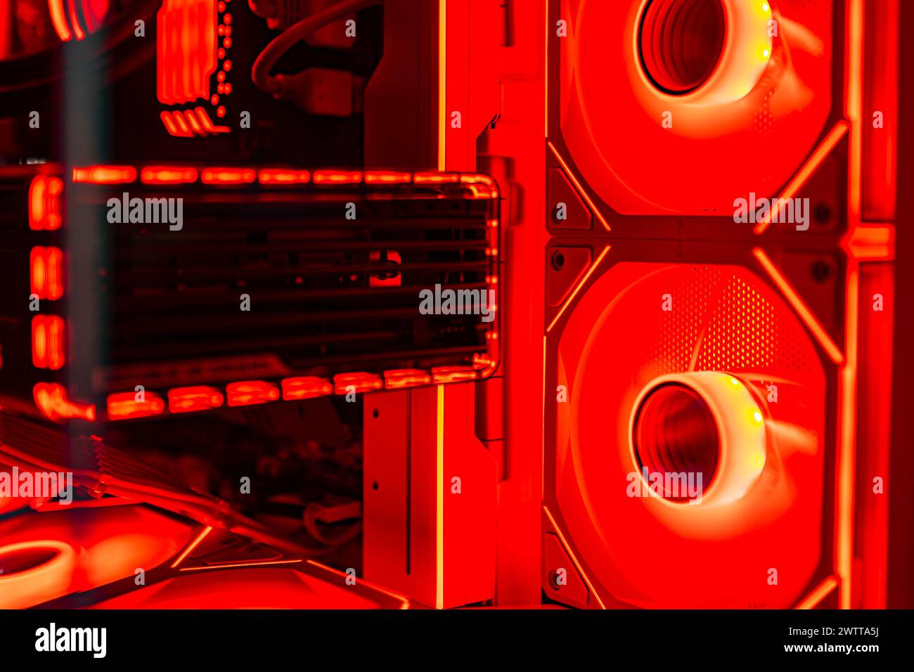 Internal components of an illuminated high-end gaming PC, symbolizing ...