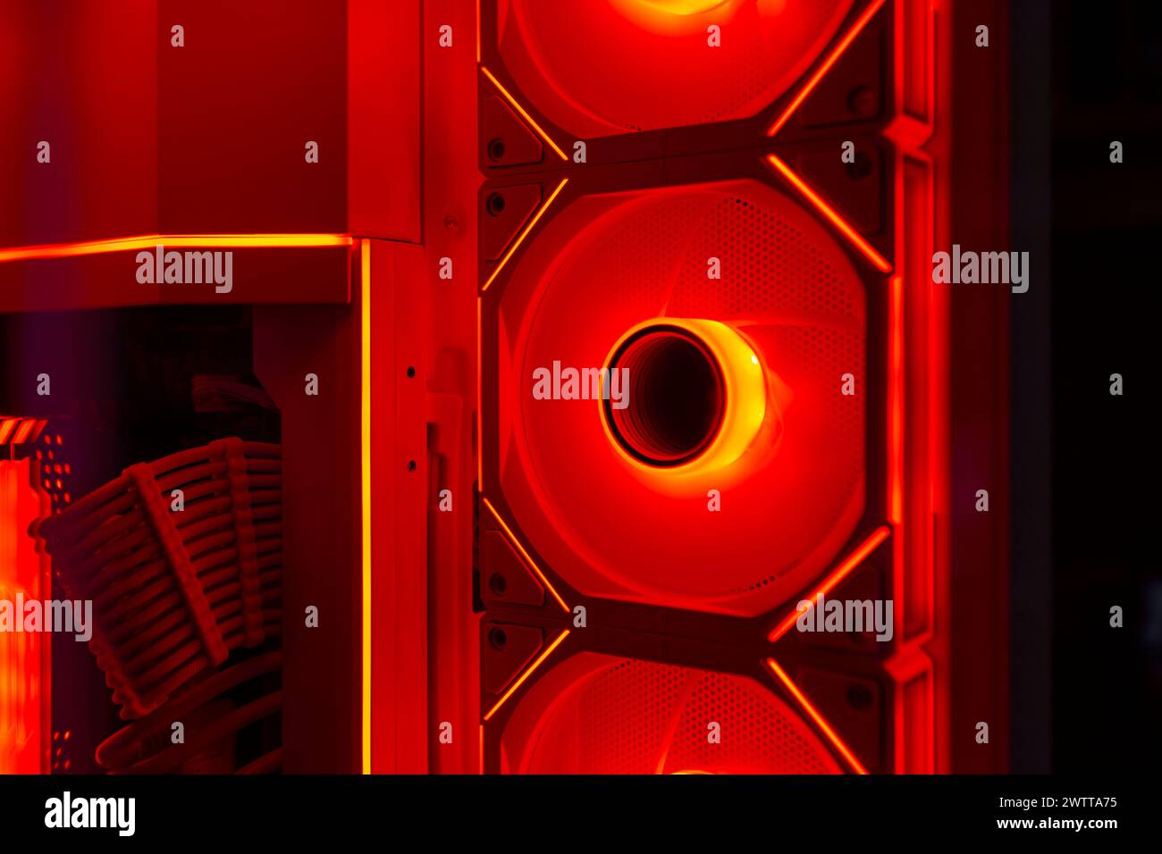 Internal components of an illuminated high-end gaming PC, symbolizing ...