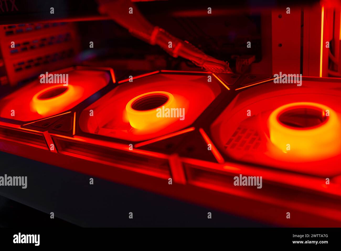Internal components of an illuminated high-end gaming PC, symbolizing ...