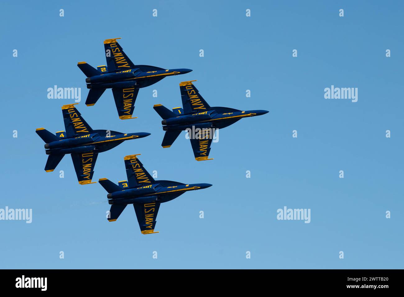 F/A-18 Super Hornets assigned to the Blue Angels perform aerobatic ...