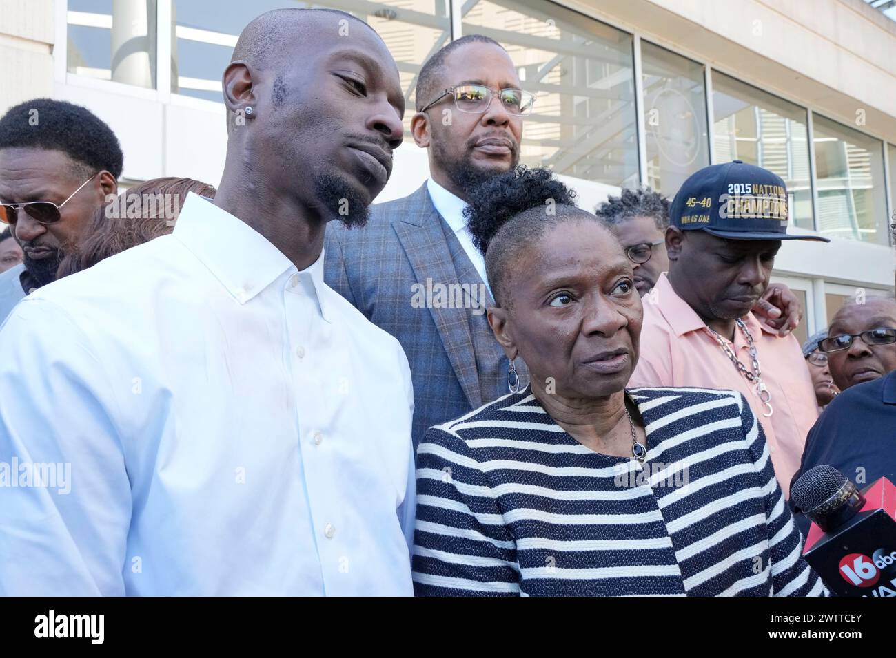 Michael Corey Jenkins, left, stands with his mother Mary Jenkins ...