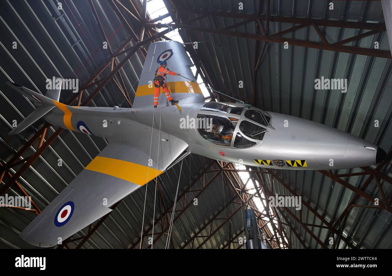 Industrial rope access specialists rappel at the Royal Air Force Museum ...