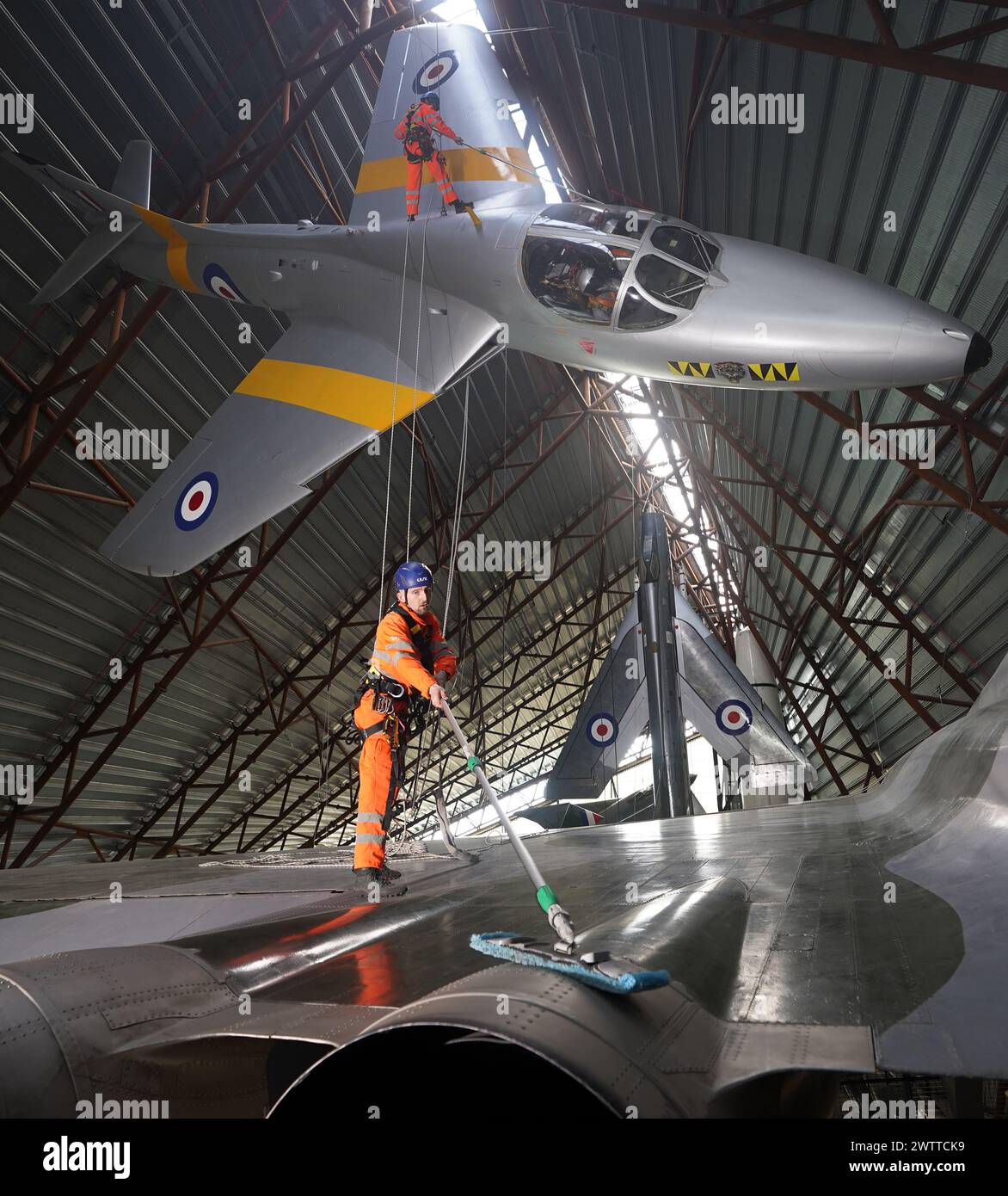 Industrial rope access specialists rappel at the Royal Air Force Museum ...